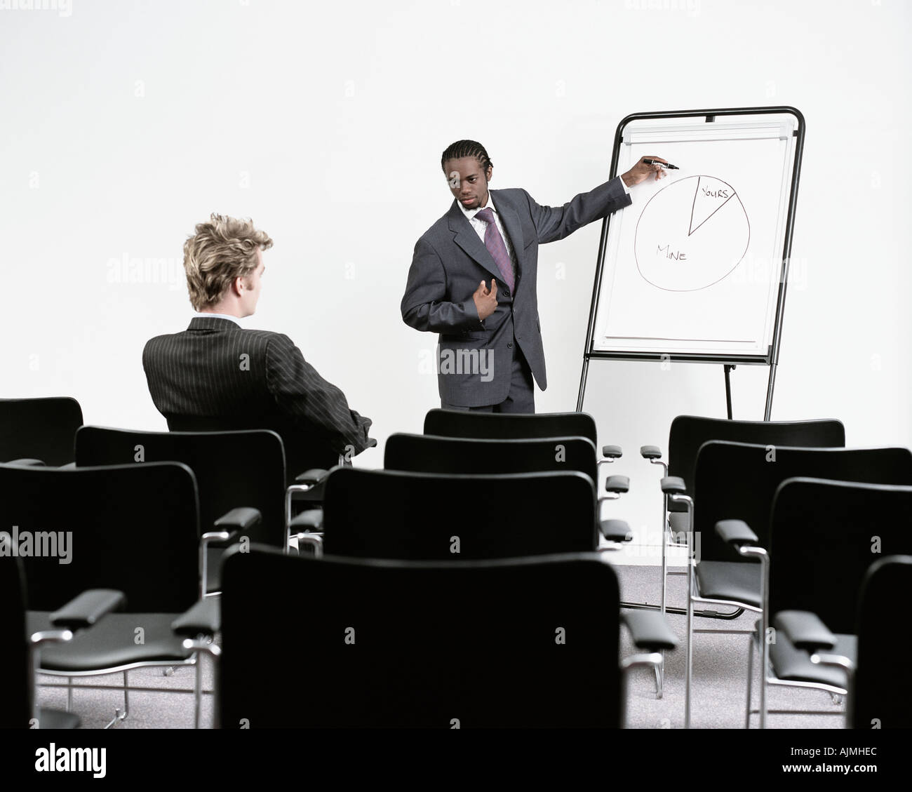 Two businessmen in conference room Stock Photo - Alamy