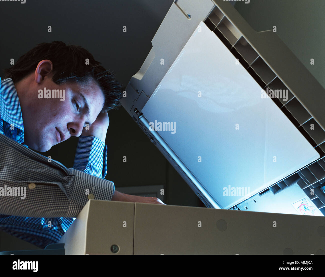 Photocopying man hi-res stock photography and images - Alamy