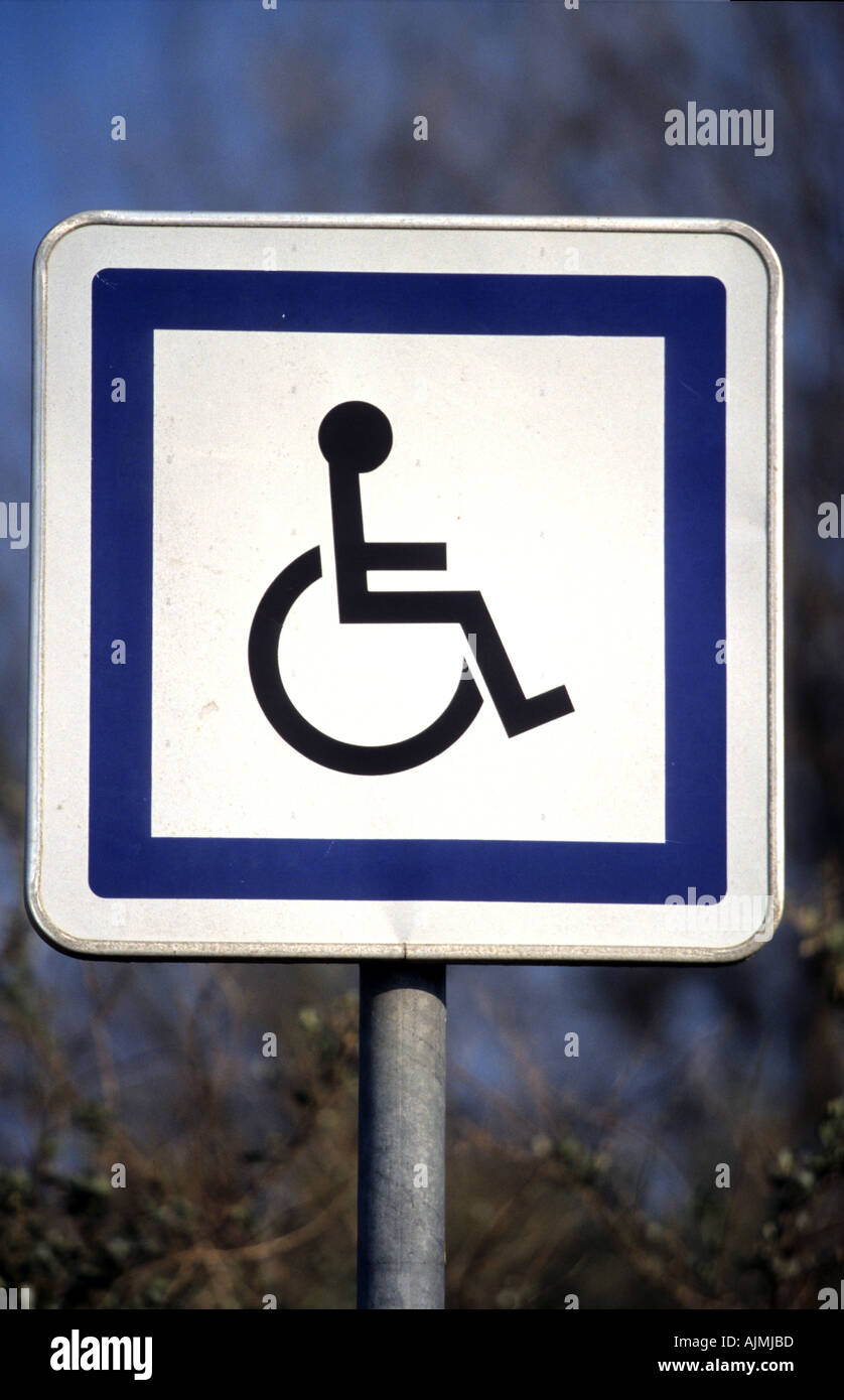 A blue and white invalid disabled handicapped or wheelchair parking ...