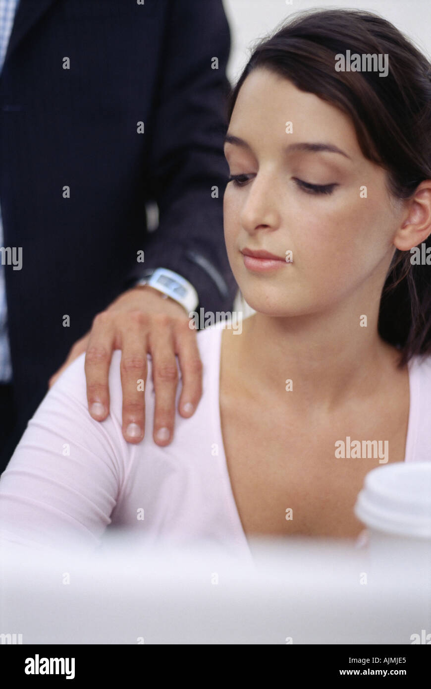Hand gripping shoulder hi-res stock photography and images - Alamy