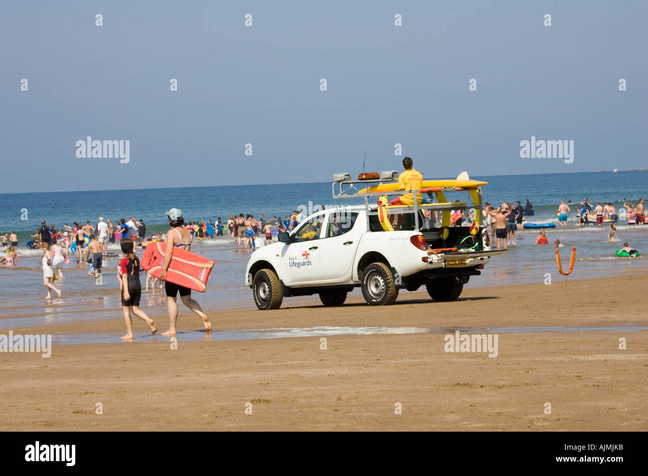 RNLI Beach Lifeguards Rescue vehicle on crowded beach in August ...