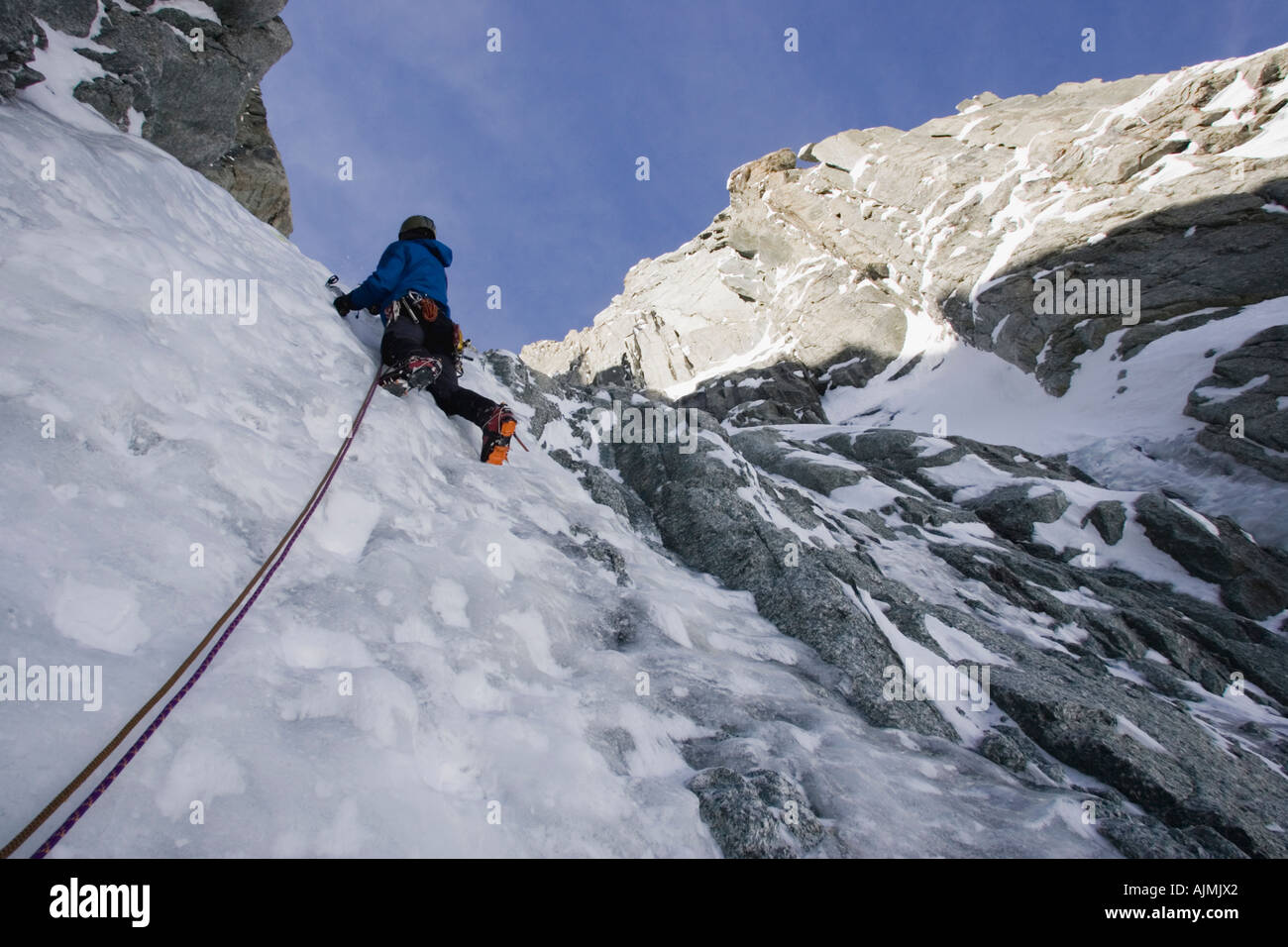 Man lead ice climbing hi-res stock photography and images - Alamy