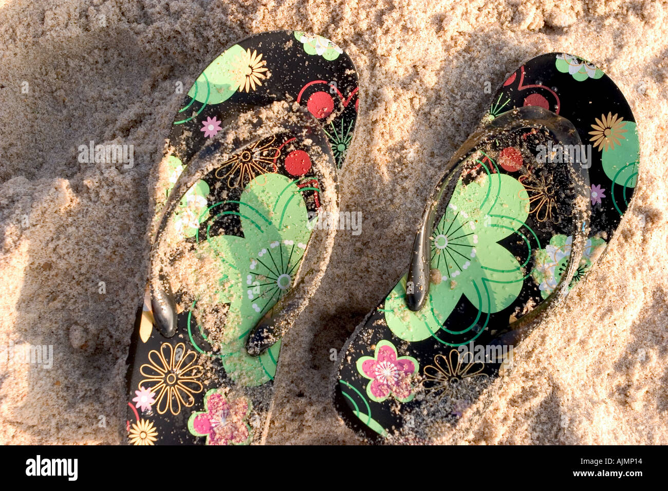Abandoned flip flop on the beach hi-res stock photography and images ...