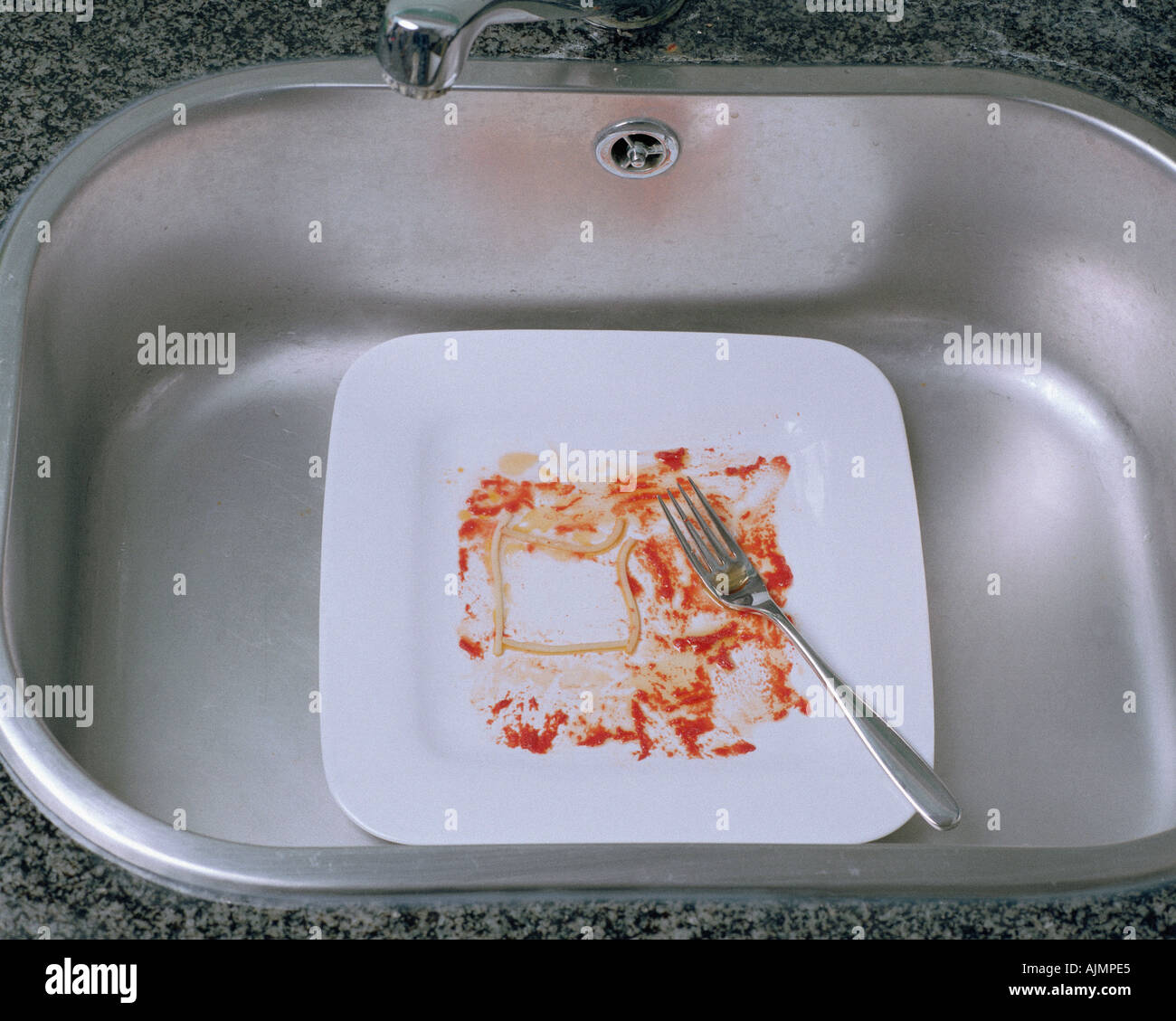 Square plate in sink Stock Photo - Alamy