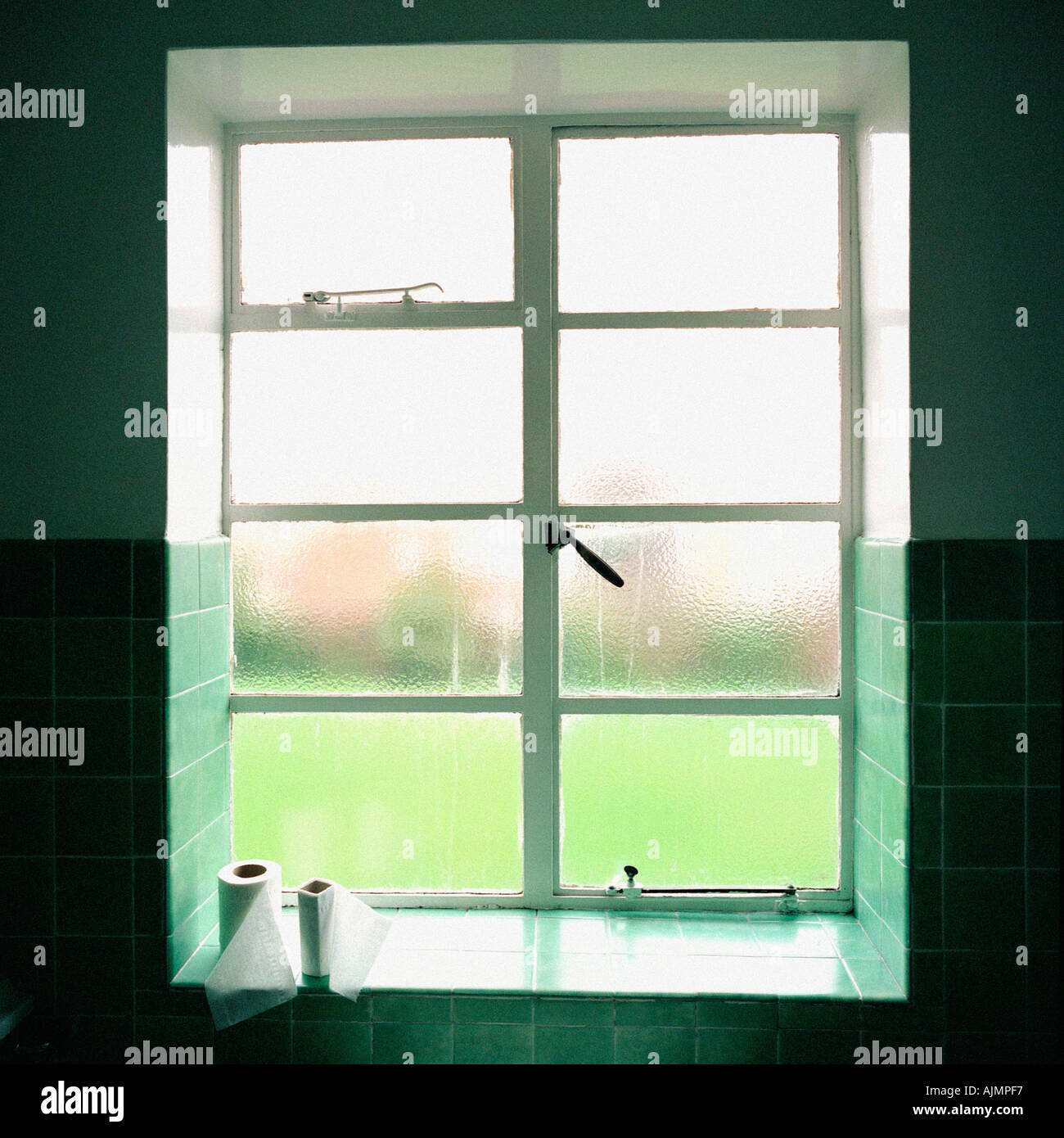 Toilet rolls on windowsill Stock Photo - Alamy