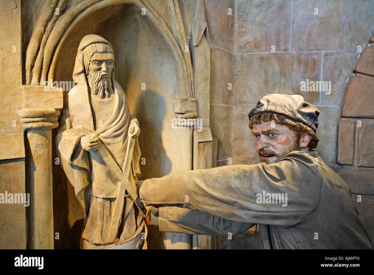 Mannequin pulling at a statue at the St Andrews Castle exhibition, Fife ...