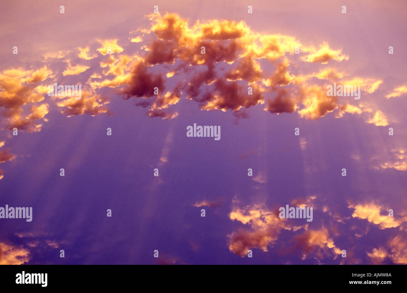 sun rays through cloud Australia horizontal Stock Photo - Alamy