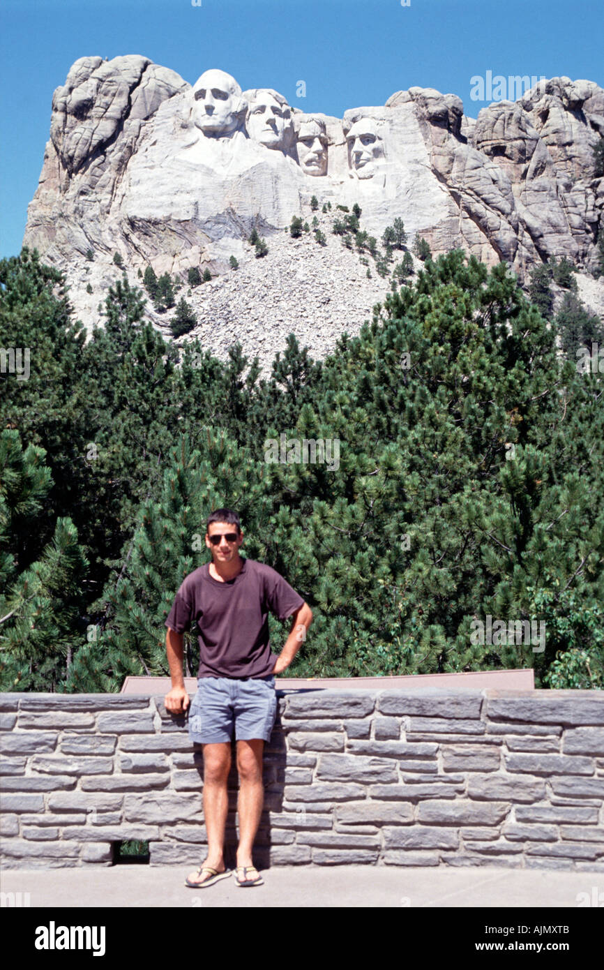 A man standing in front of Mount Rushmore Stock Photo - Alamy