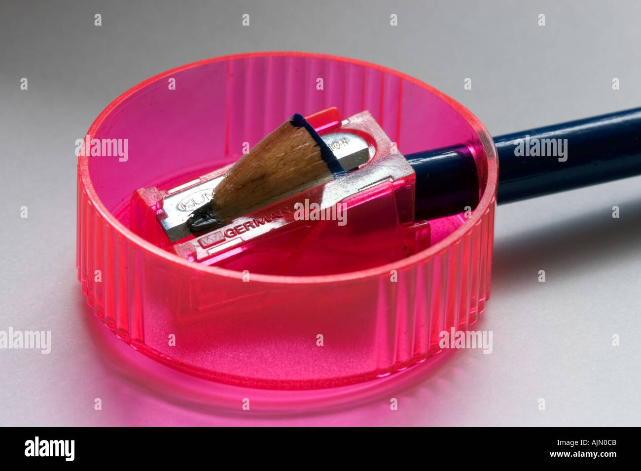 Pencil being sharpened Stock Photo - Alamy