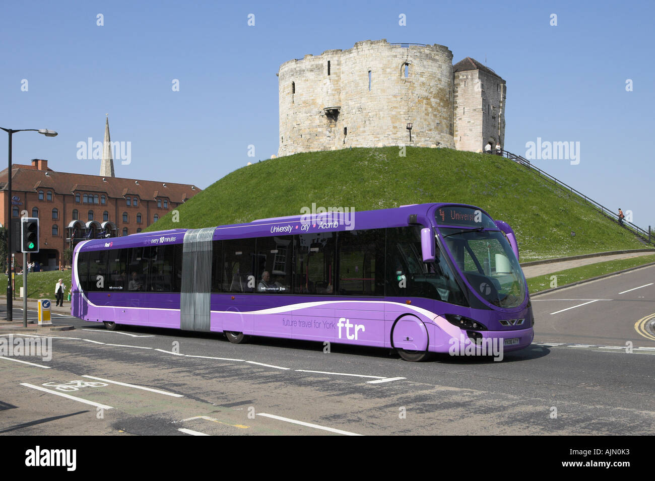 The new First bus 'ftr' street car travelling past Cliffords Tower in ...