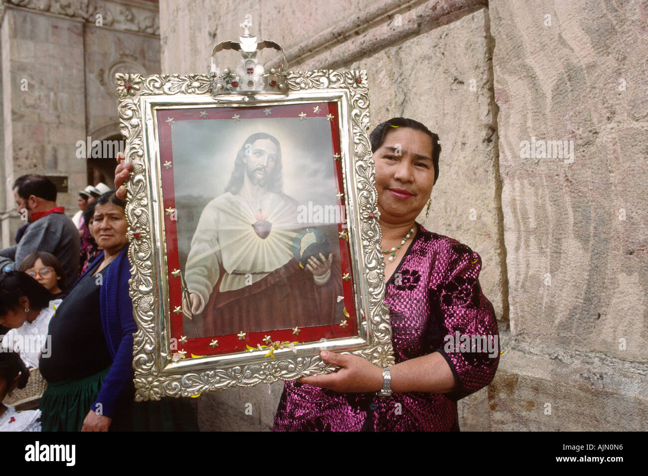 Ecuador Cuenca religion woman with picture of Jesus Stock Photo - Alamy