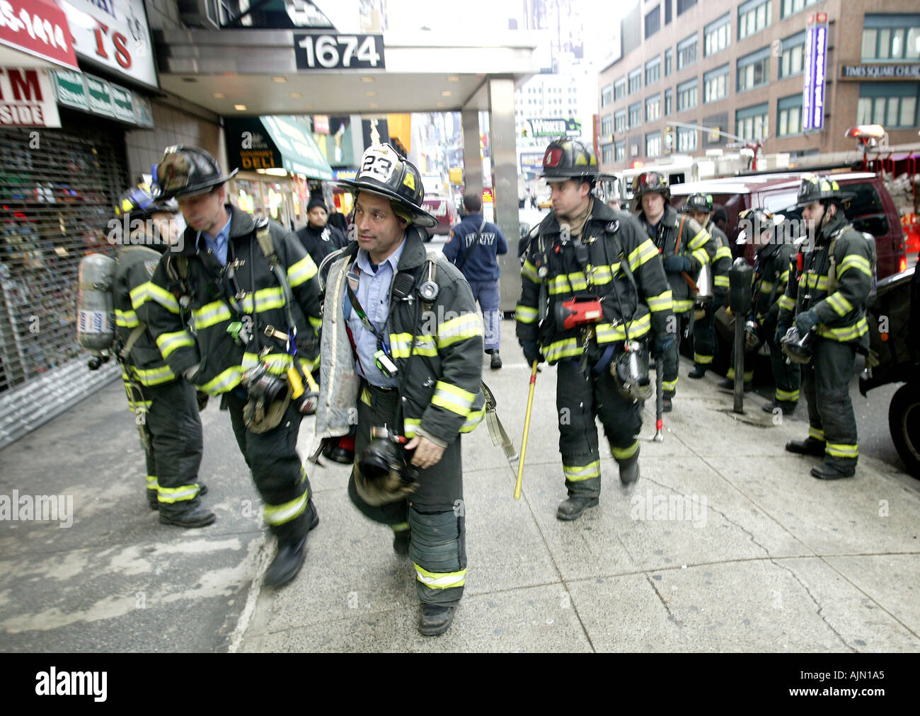 NEW YORK FIREMEN ATTEND EMERGENCY Stock Photo - Alamy