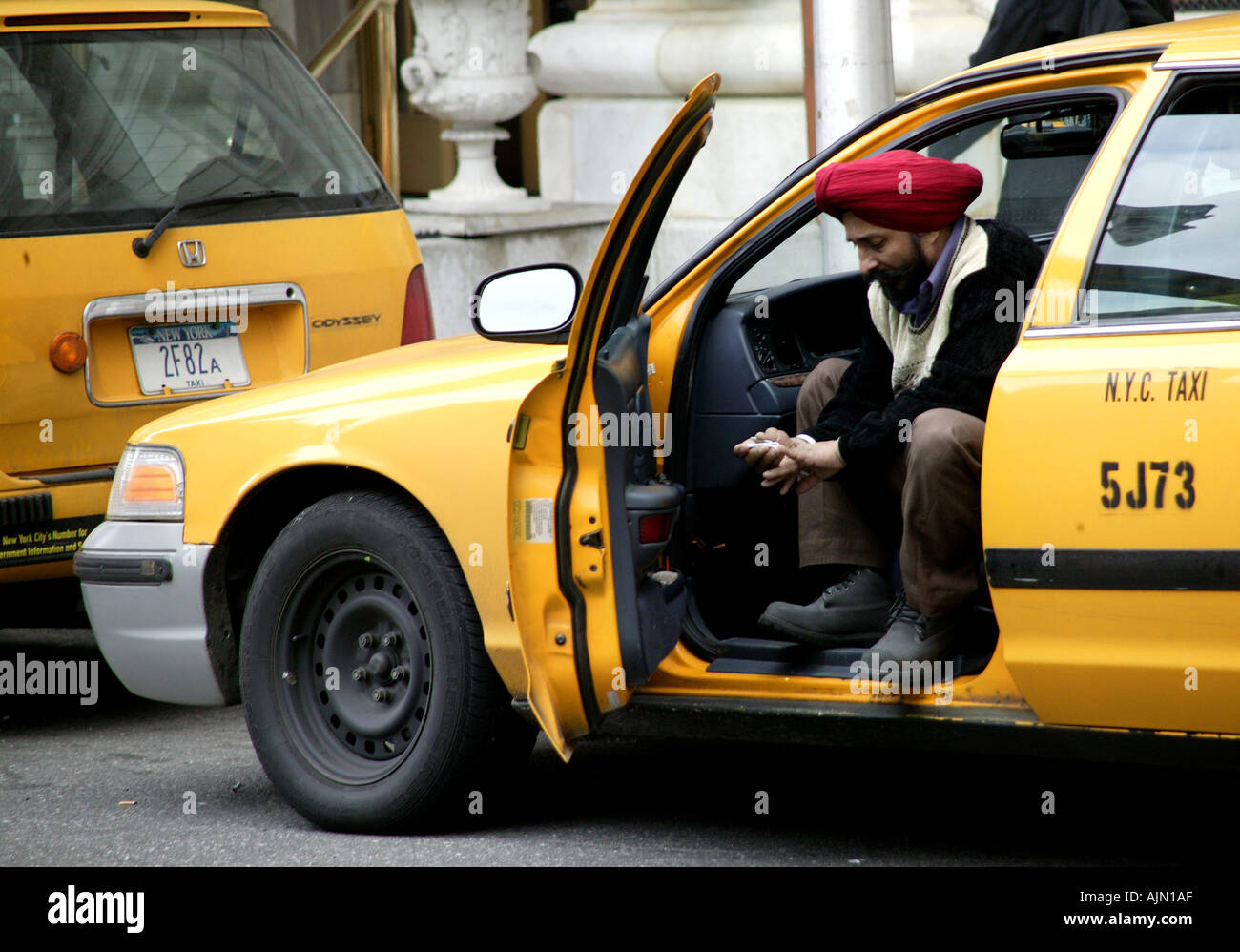 TAXI DRIVER WITH CAB NEW YORK USA Stock Photo - Alamy