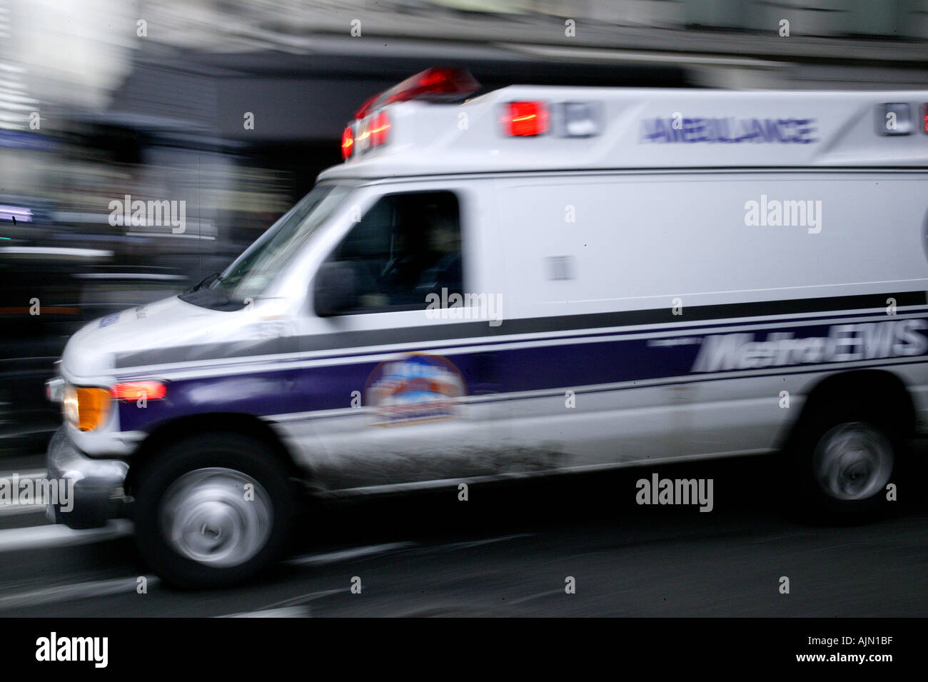 SPEEDING AMBULANCE NEW YORK USA Stock Photo - Alamy