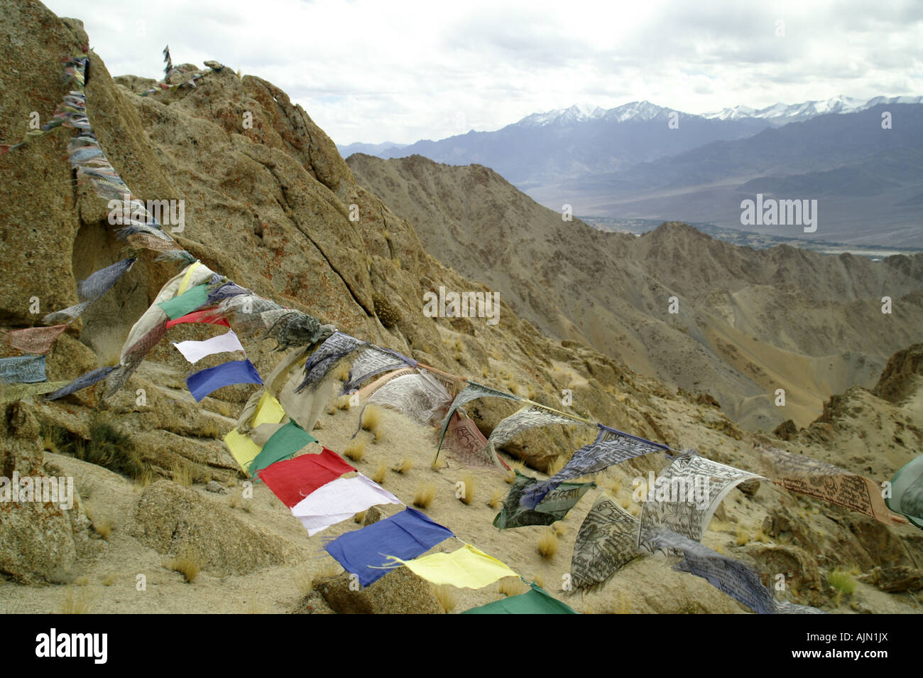 Tibetan buddhist prayer flags above Leh Ladakh Valley mountains ...
