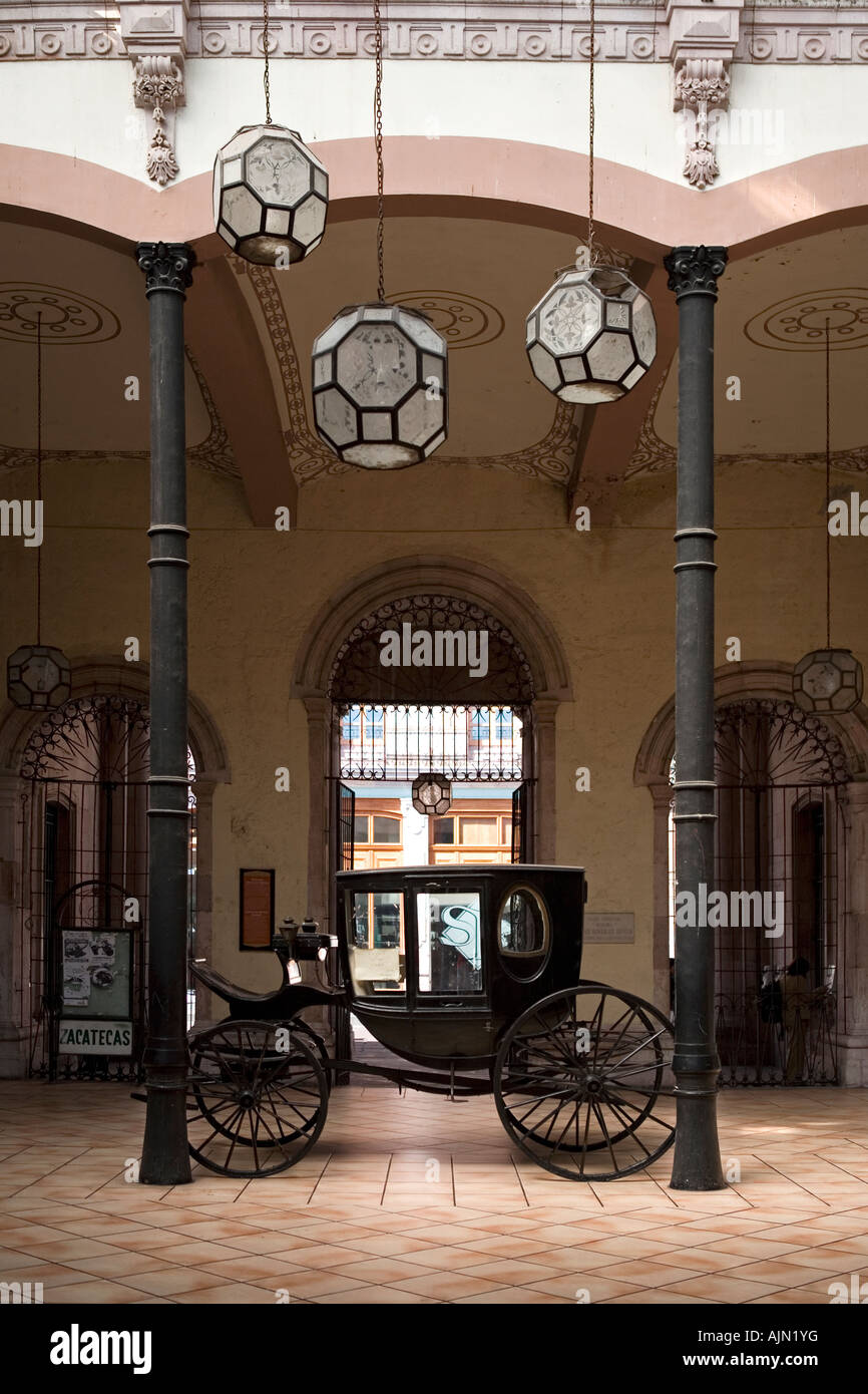 Old colonial carriage for display in the covered market Zacatecas ...