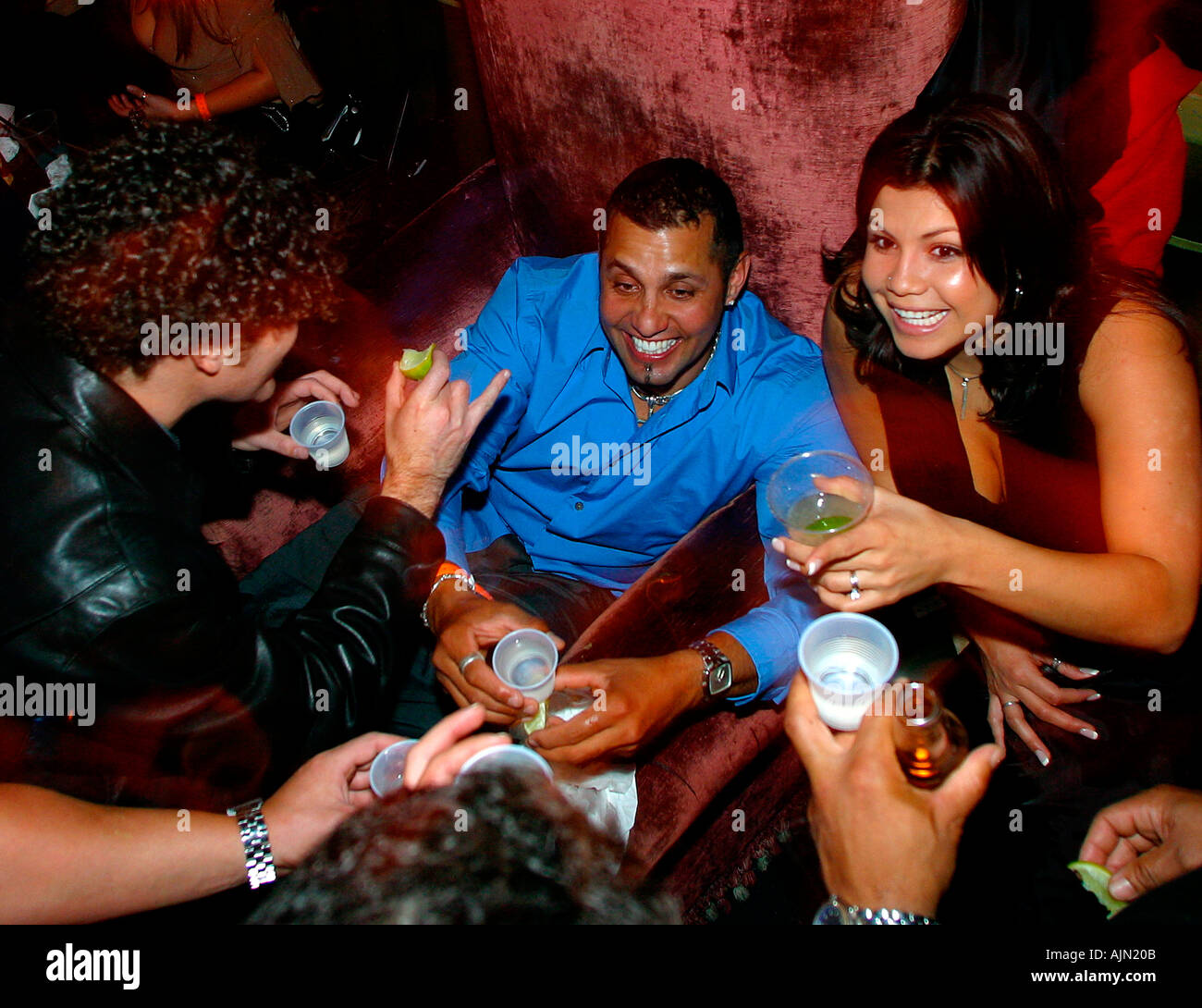 PEOPLE CELEBRATING IN A BAR Stock Photo - Alamy