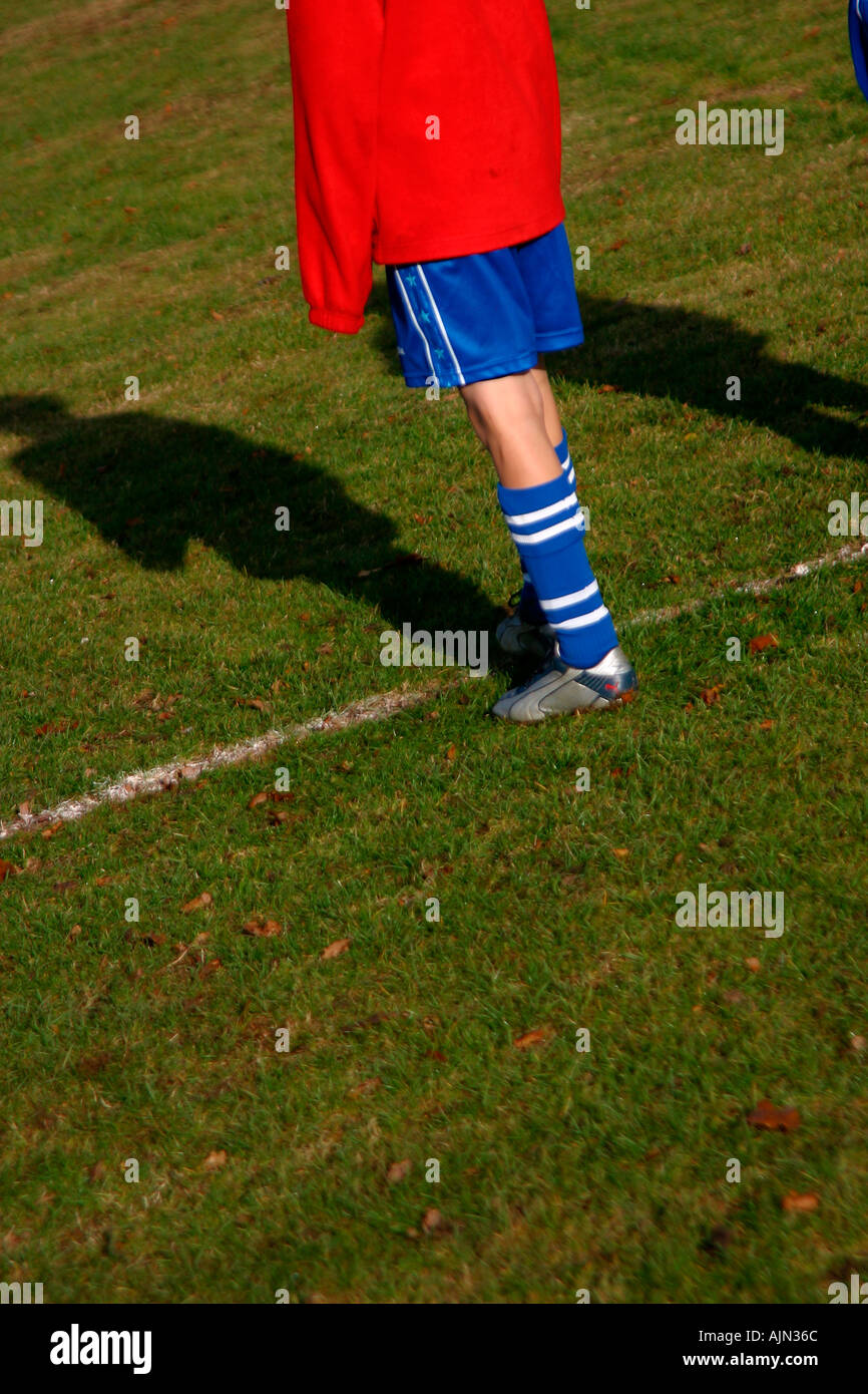 boy footballers on pitch Stock Photo - Alamy