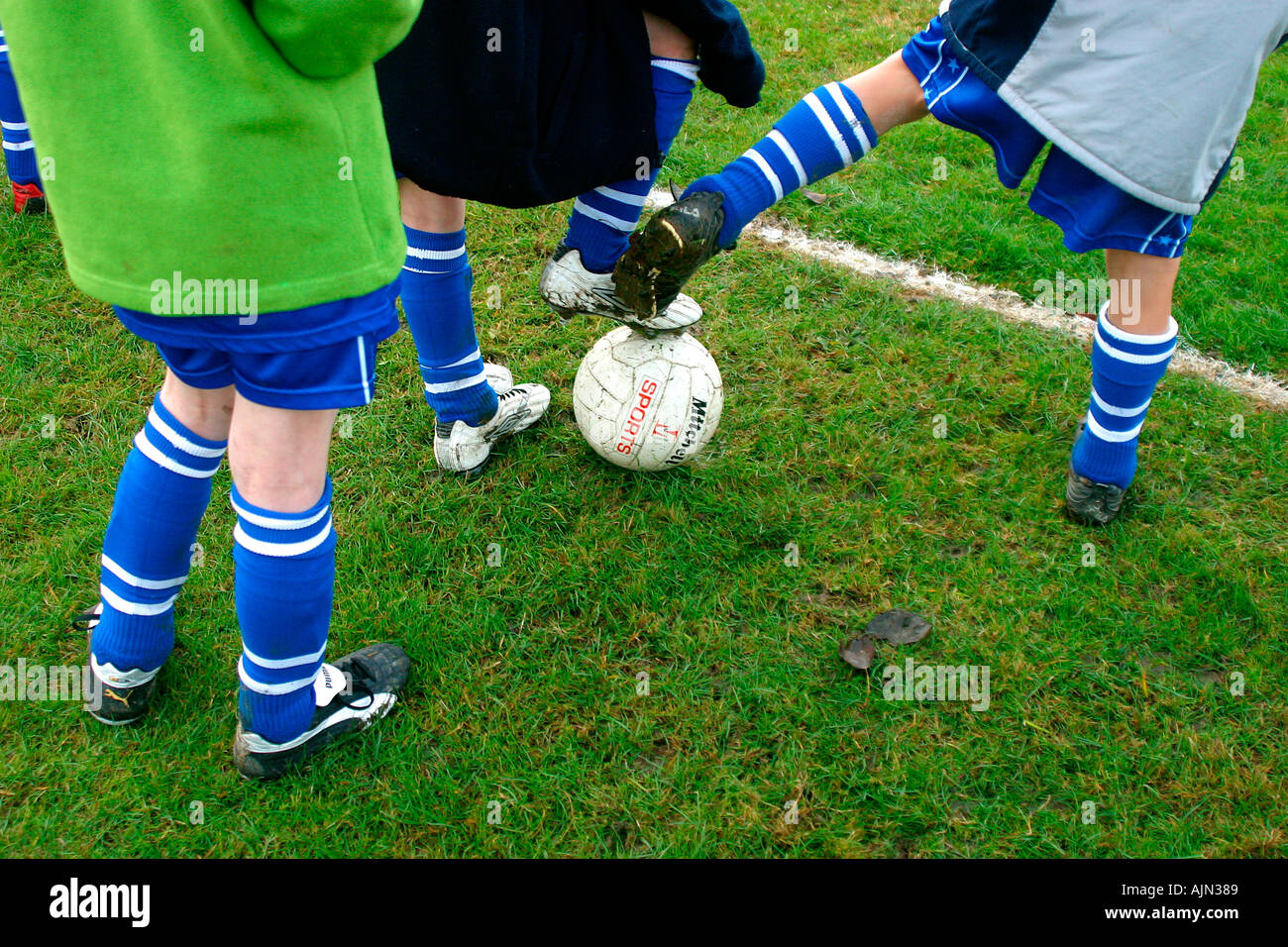 boy footballers on pitch Stock Photo - Alamy