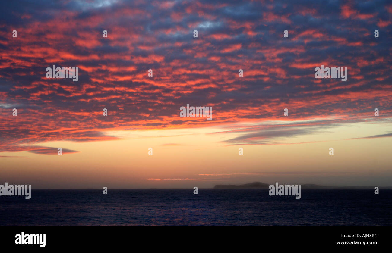 Mackerel sky sunset over hi-res stock photography and images - Alamy