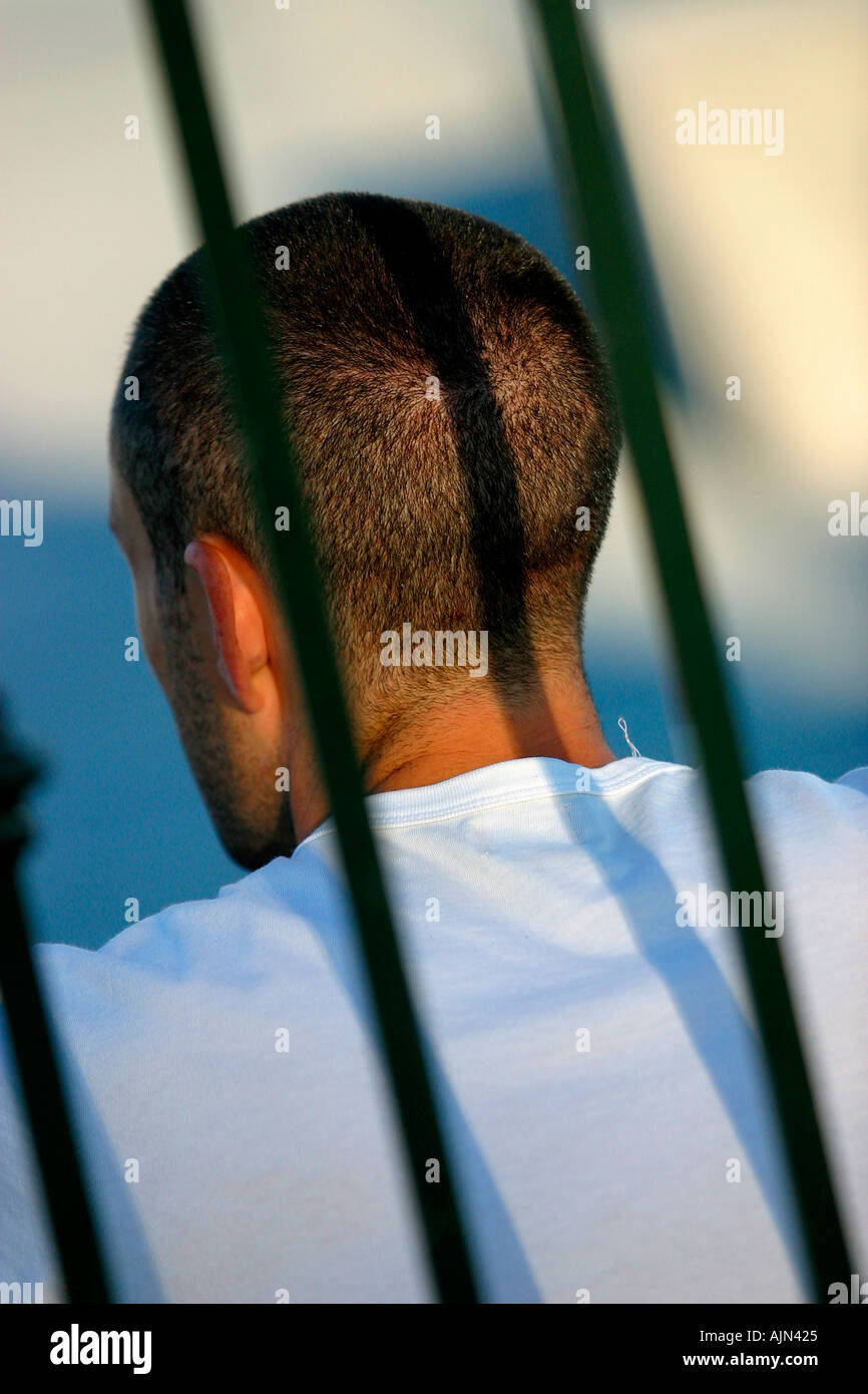 Man back view prison hi-res stock photography and images - Alamy