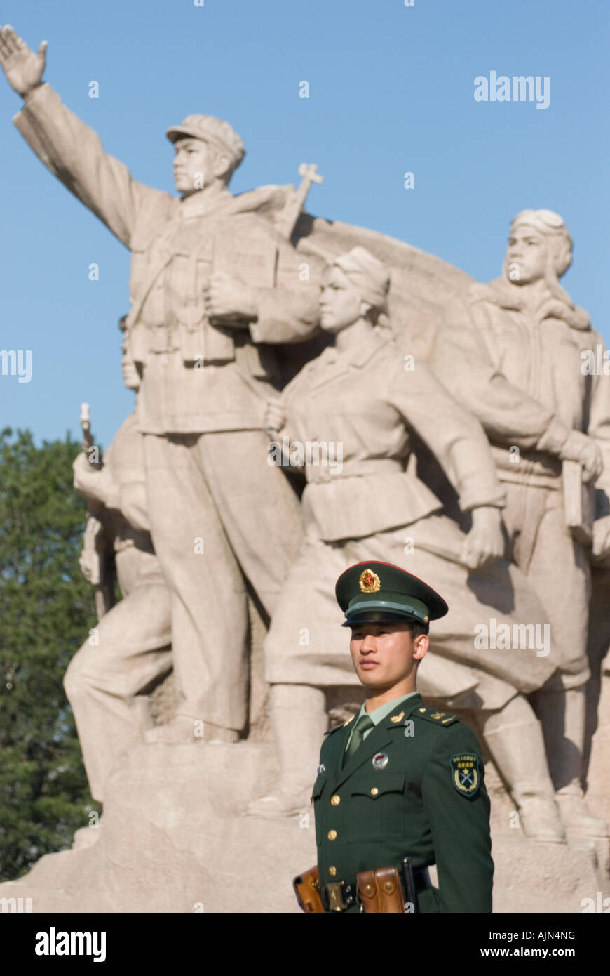 Tiananmen Square: communist heroes statue and army guard Stock Photo ...