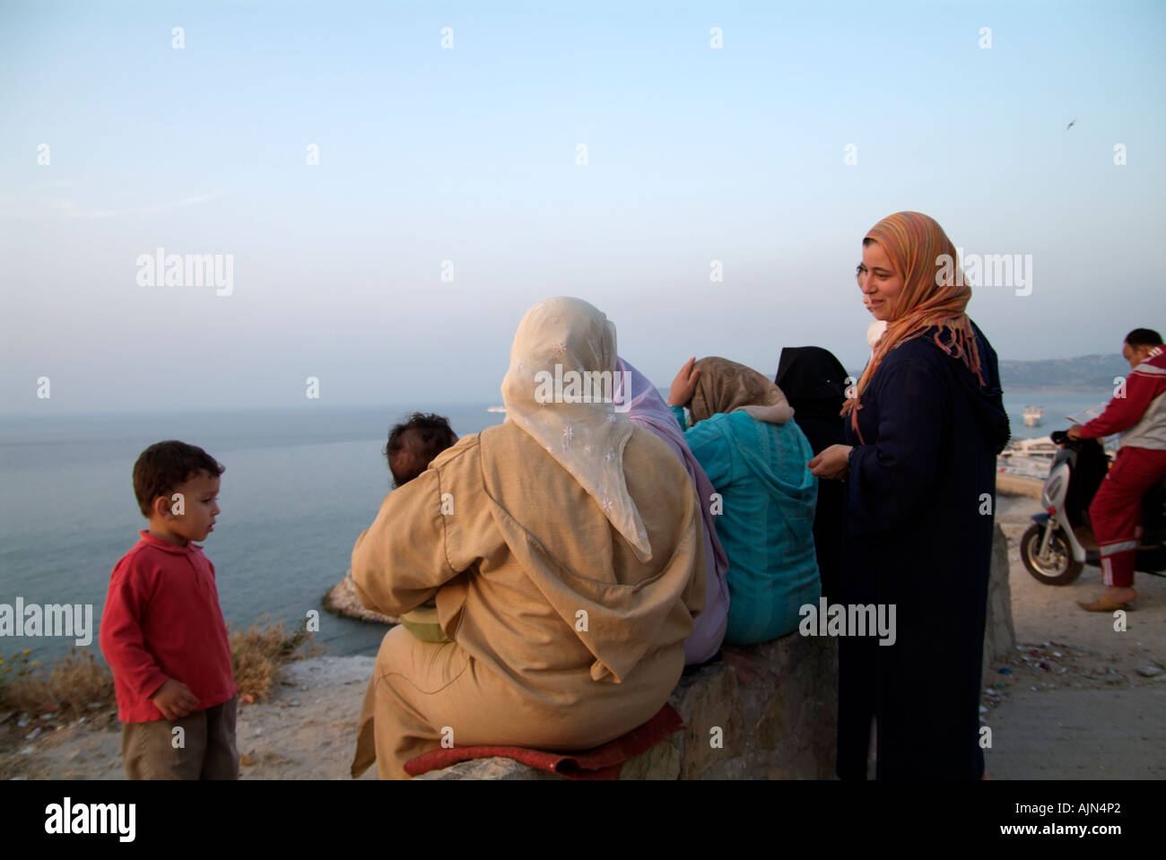 Evening ritual of watching the sunset whilst the women gossip and the ...