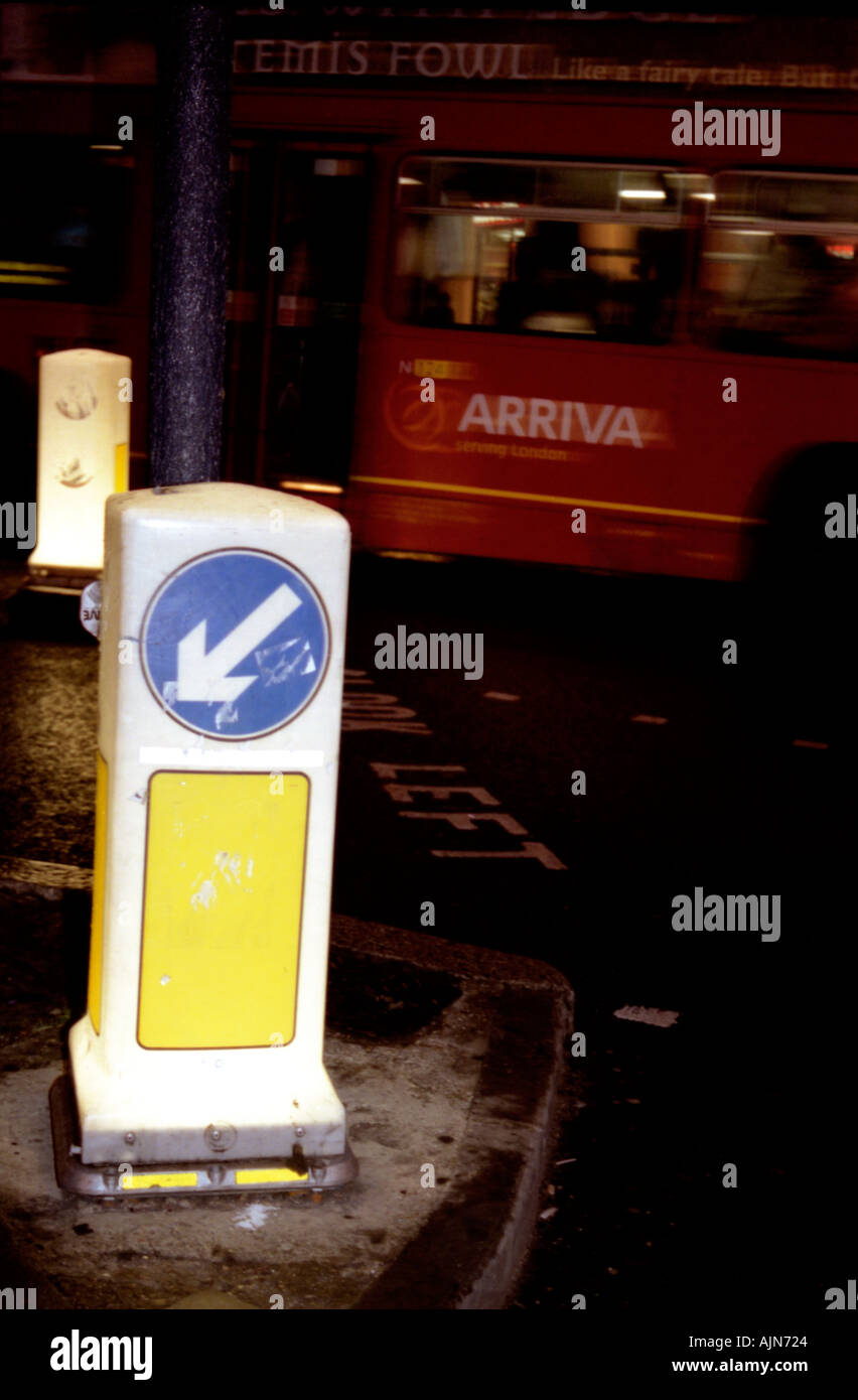Road bollard at night London UK Stock Photo - Alamy