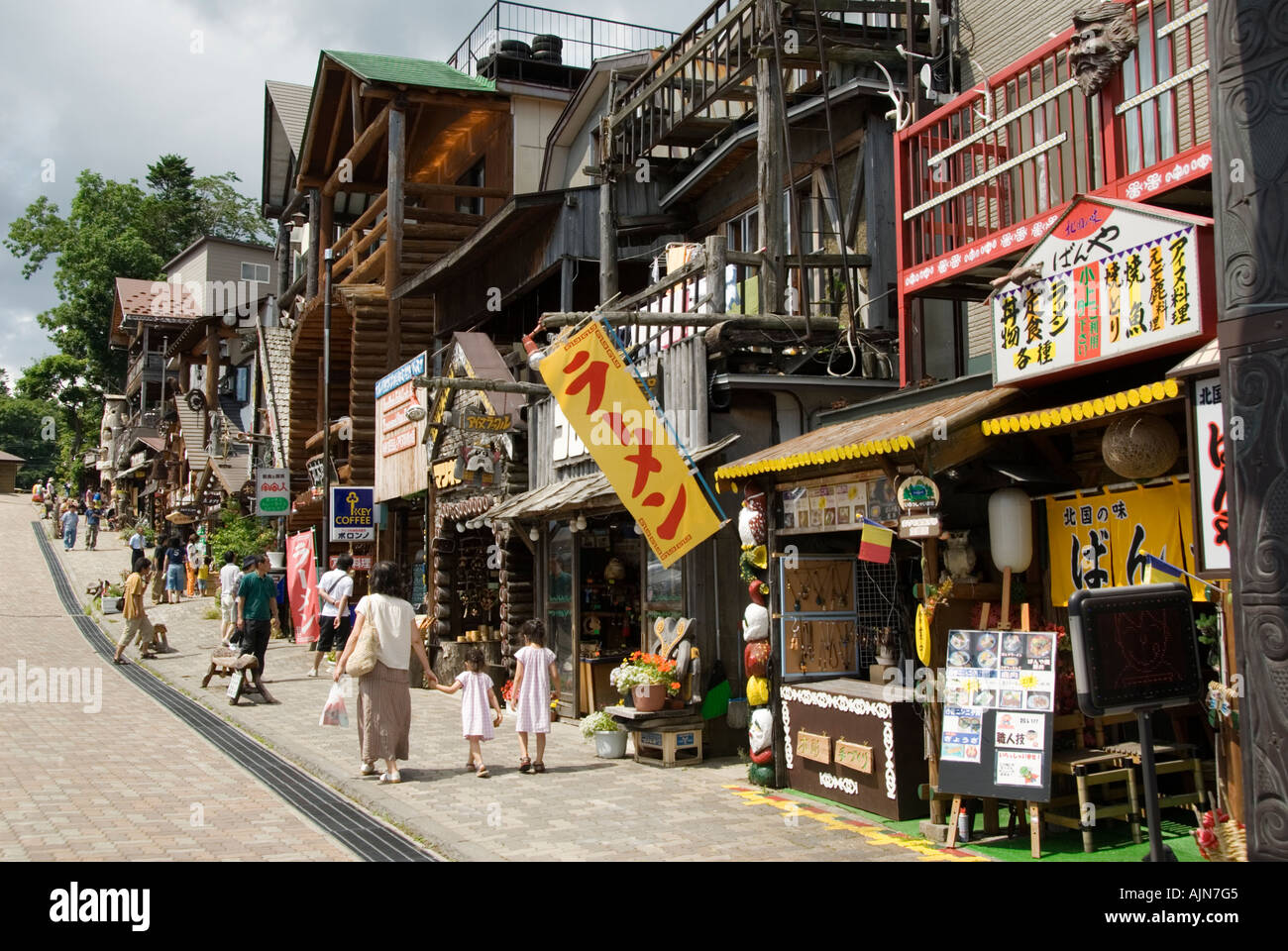 Tourist Ainu ethnic shopping street in Akan Kohan village beside Lake ...