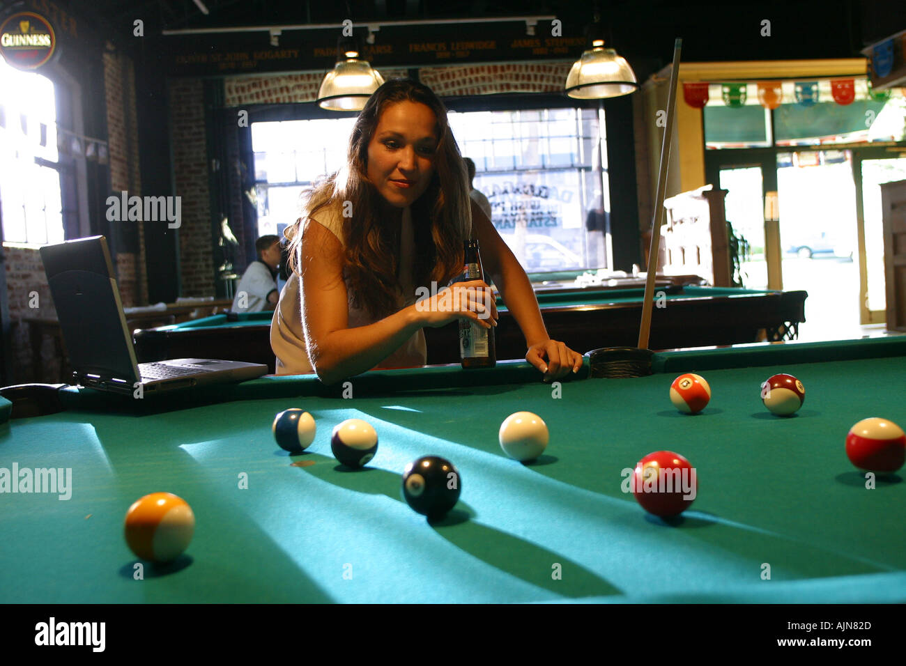WOMAN IN POOL HALL Stock Photo - Alamy