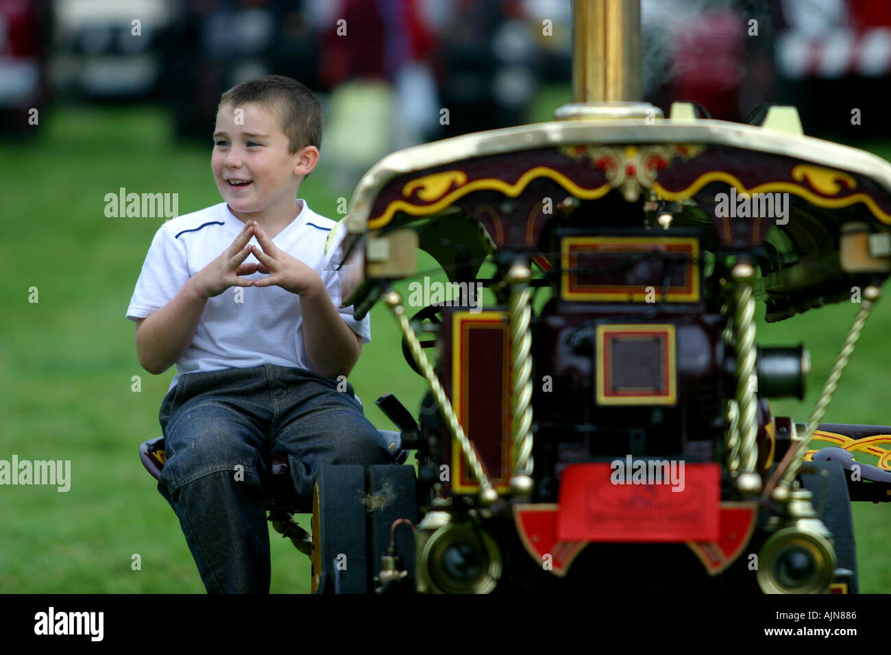 BOY SAT ON VINTAGE STEAM ENGINE Stock Photo - Alamy