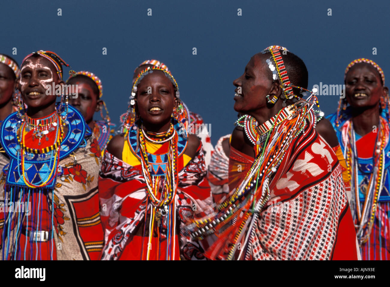 Masai Women Sing and Dance a Welcome to their Manyatta Stock Photo - Alamy