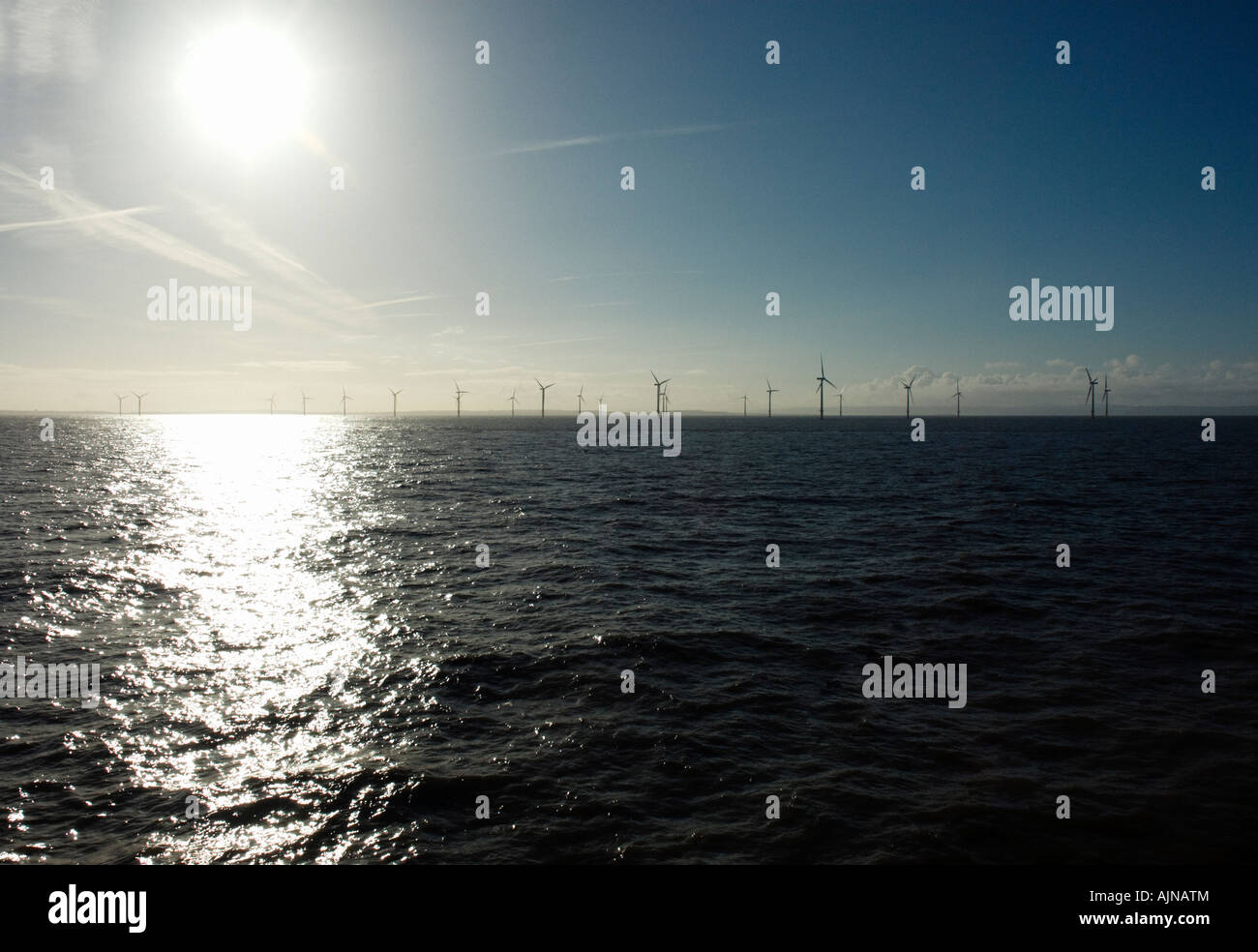 Wind farm and sun Stock Photo - Alamy