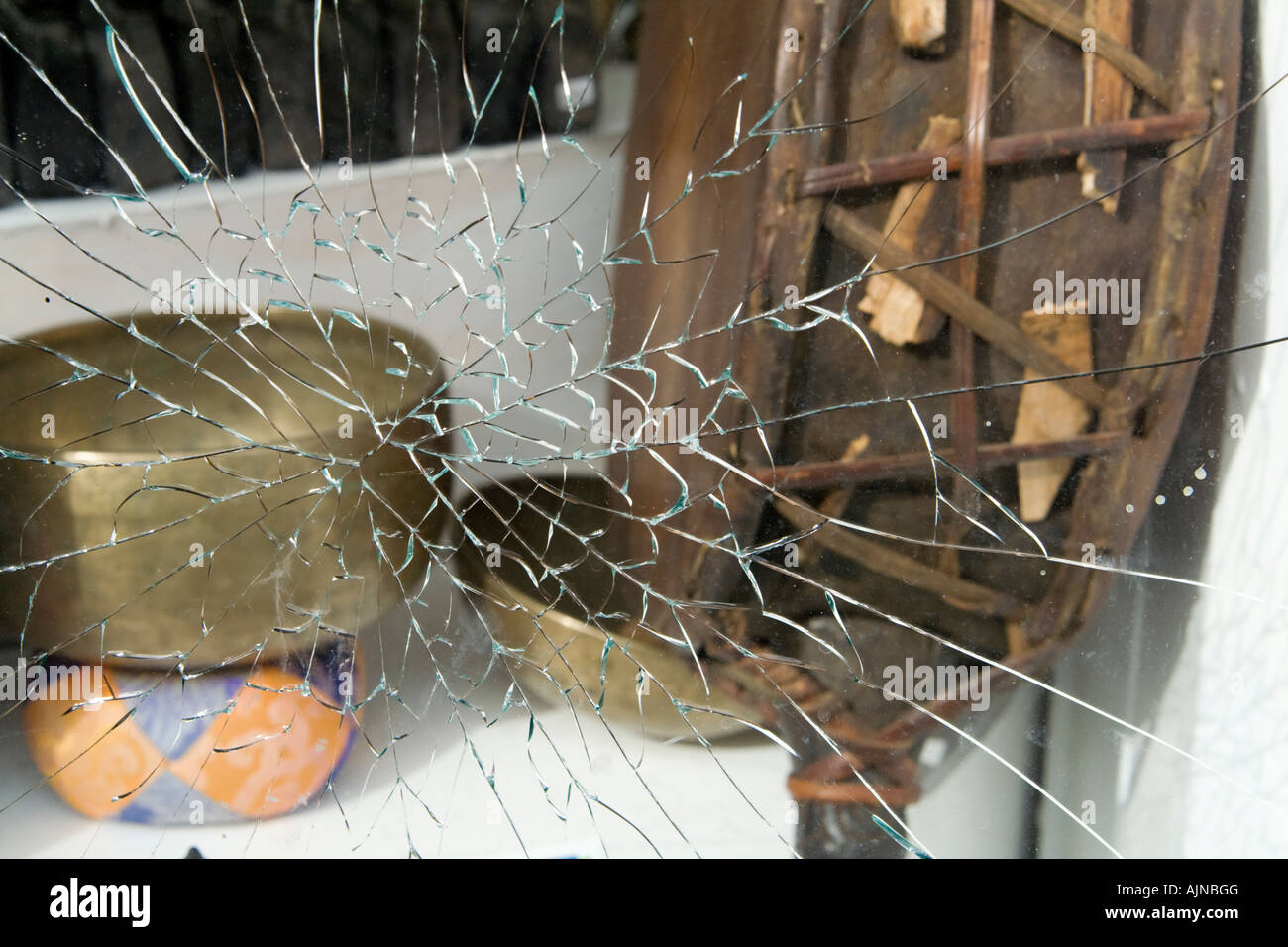 A smashed shop window Stock Photo - Alamy