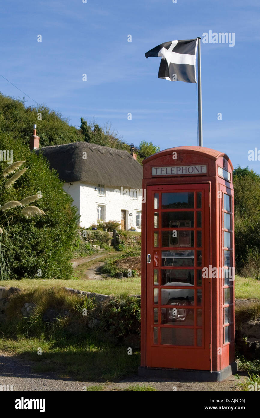 Public telephone box and Cornish flag, Porthoustock, Cornwall Stock ...