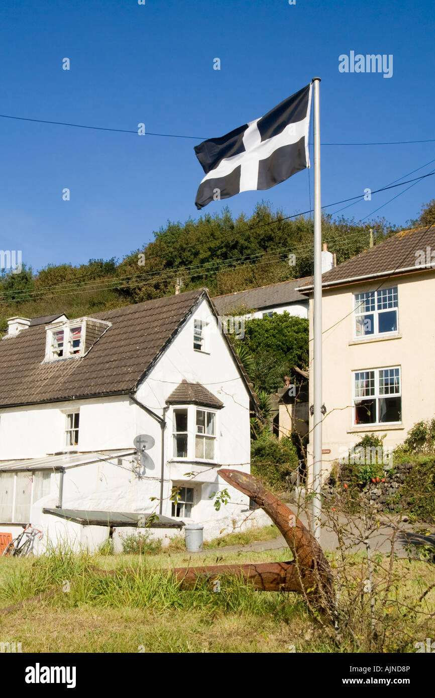 The Cornish flag ^flying at Porthoustock, Cornwall Stock Photo - Alamy