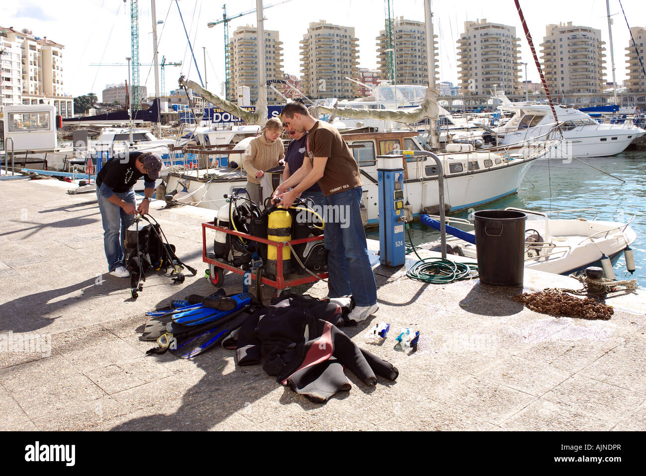 Divers preparing gear, Marina Bay, Gibraltar Stock Photo - Alamy