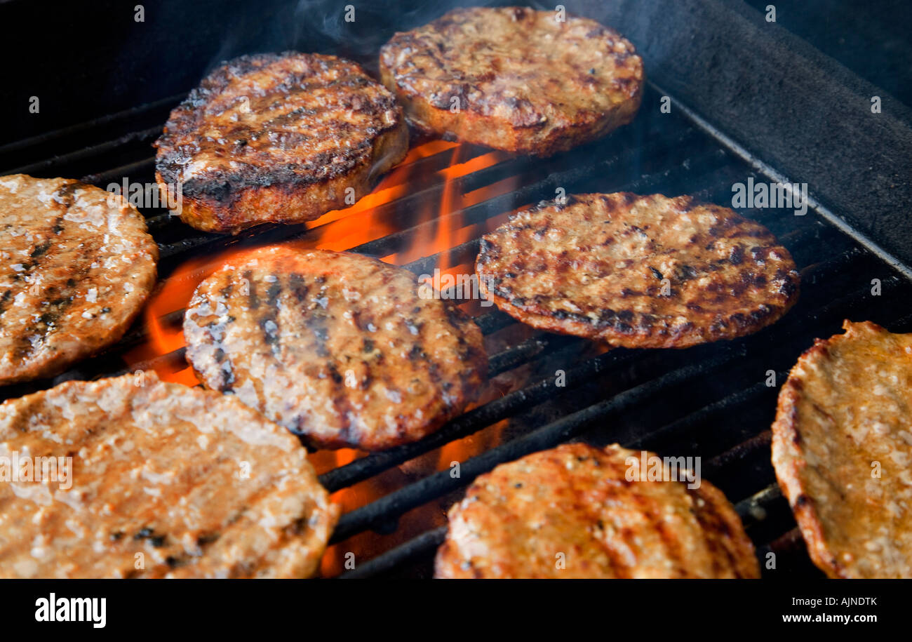 Hamburger patties cooking on the grill Stock Photo - Alamy