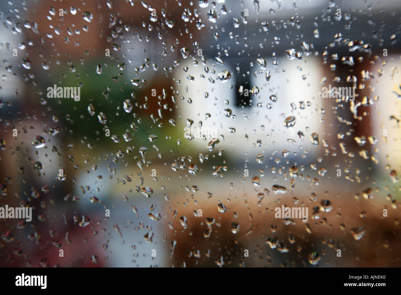 Raindrops on windowpane Stock Photo - Alamy
