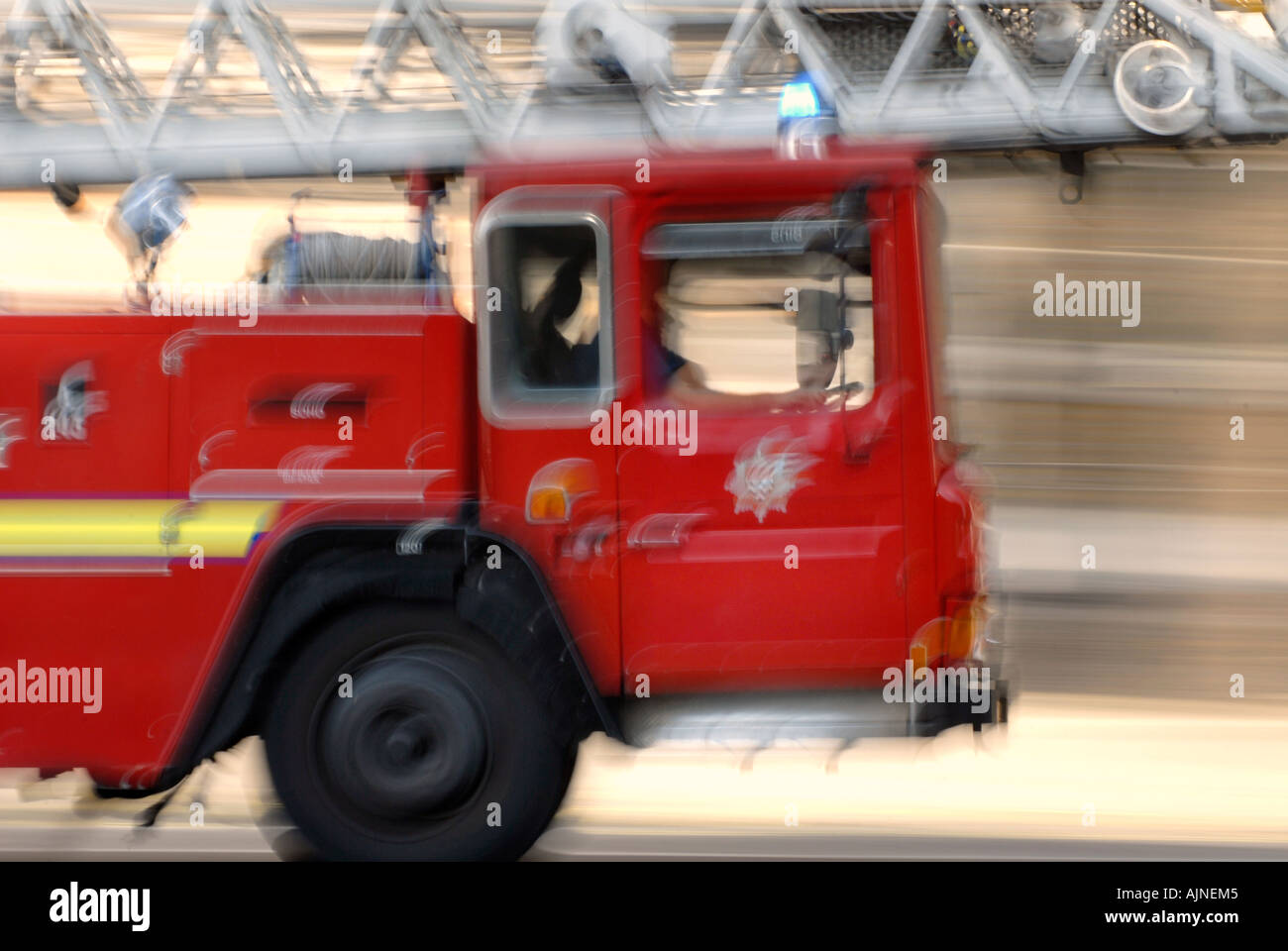 Blurred fire engine image Stock Photo - Alamy