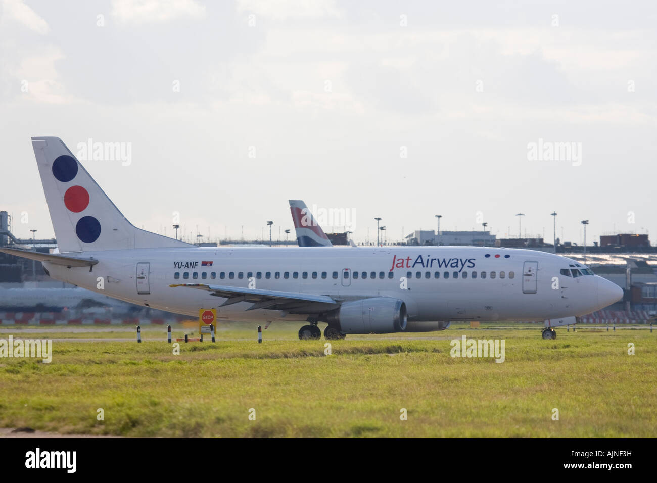JAT Airways Boeing 737-3H9 at London Heathrow Airport, UK Stock Photo ...