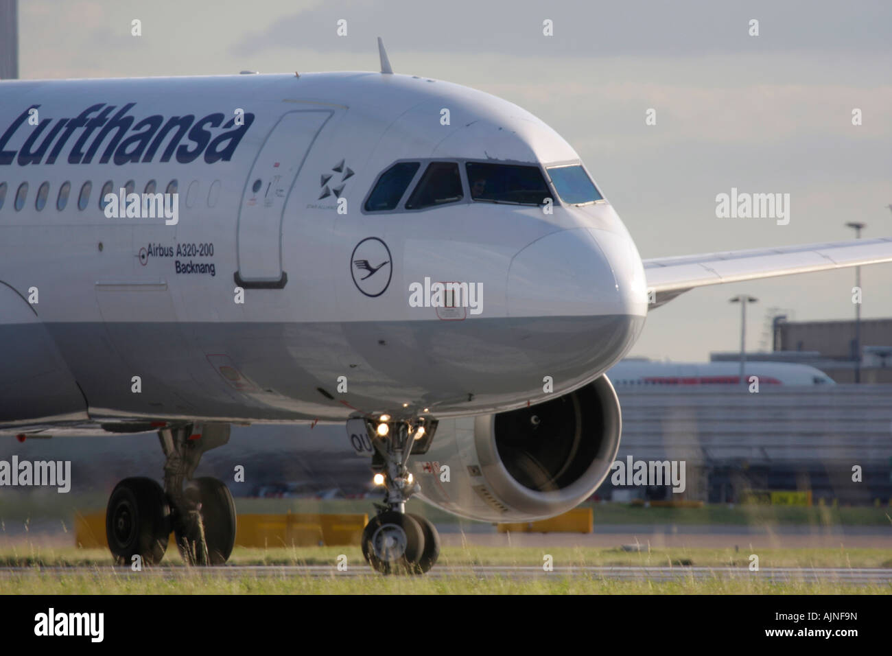 Close-up of Lufthansa Airbus A320 taxiing for departure at London ...