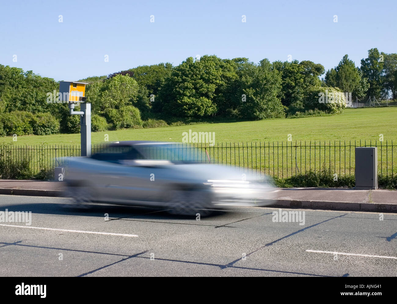 Car passing Gatso camera at speed Stock Photo - Alamy