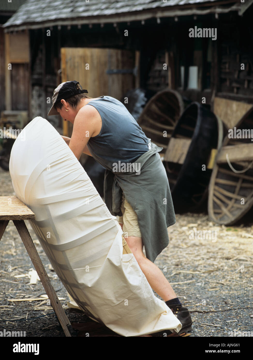 CORACLE BUILDING with Cotton calico material stretched and folded round ...