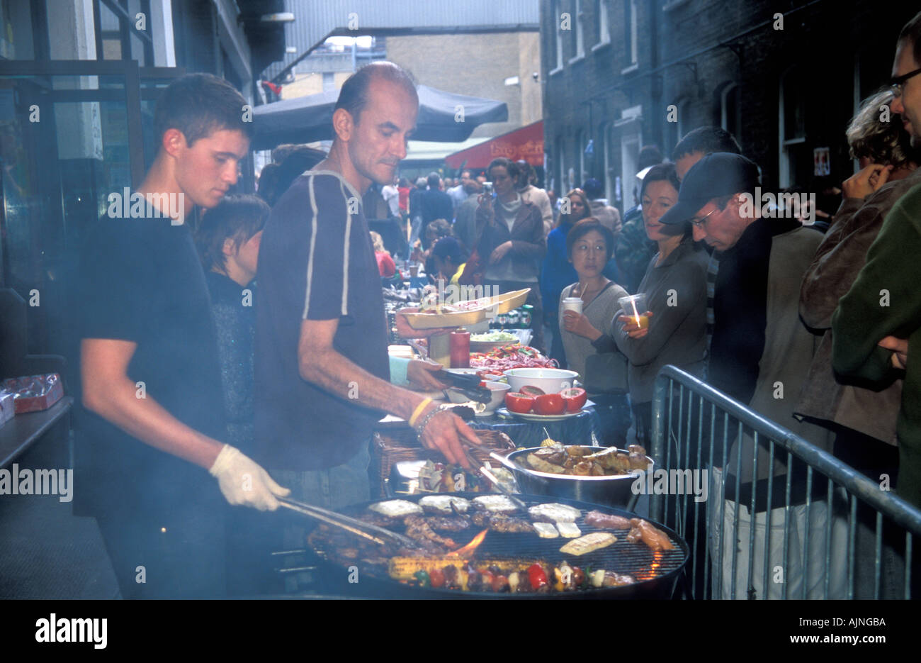 Cooking food on a barbicue Stock Photo - Alamy