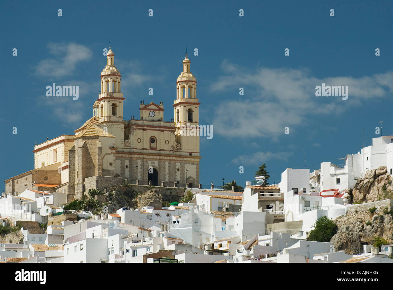 Olvera Church with white houses in Cádiz province, Andalucia, Spain ...