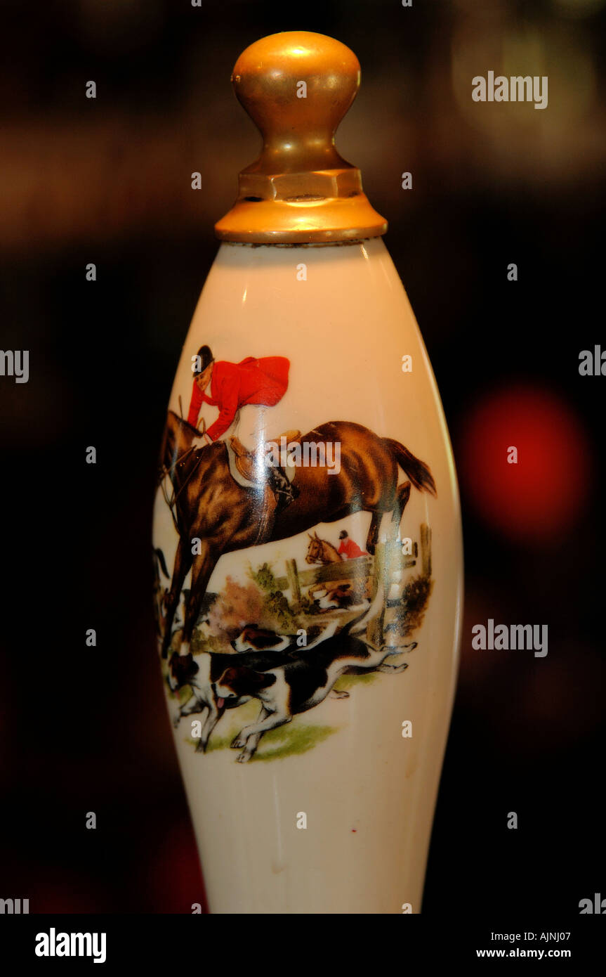 Hand pull beer pump with hunting scene Stock Photo - Alamy