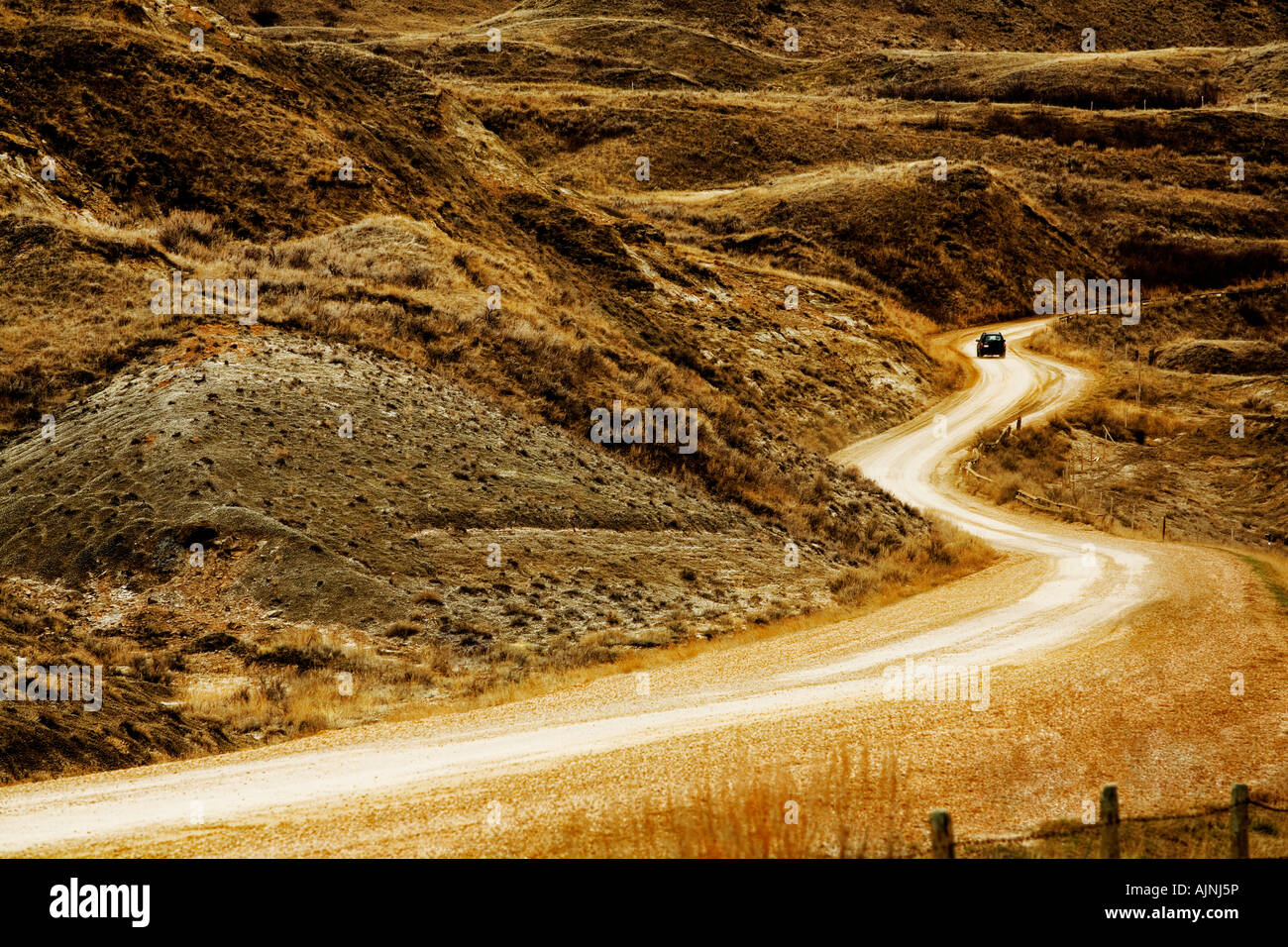 A car running on curving road Stock Photo - Alamy