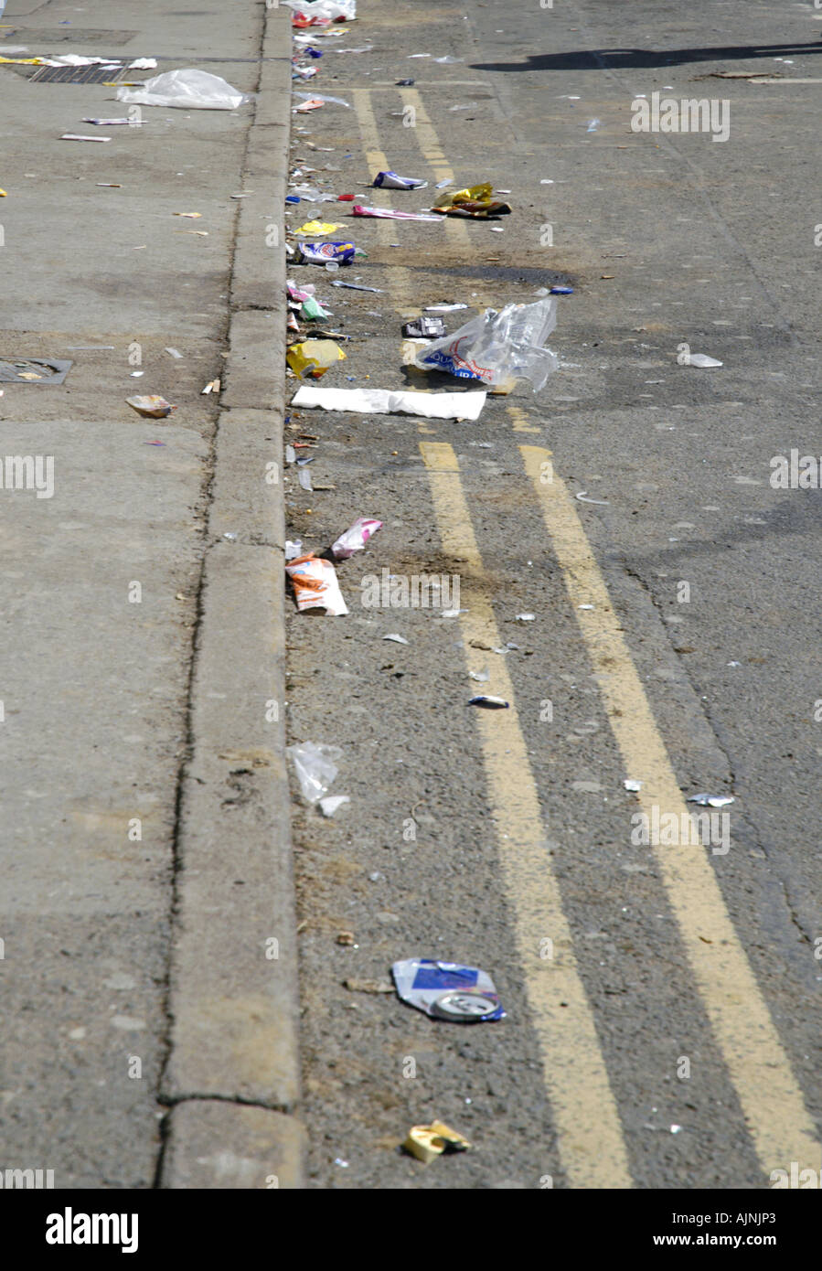 Garbage in gutter hi-res stock photography and images - Alamy