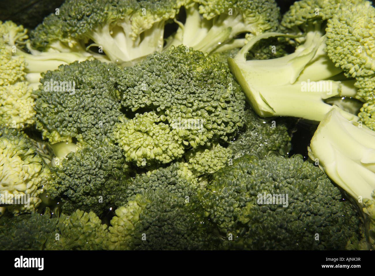 broccoli florets cooking in pan of water Stock Photo - Alamy